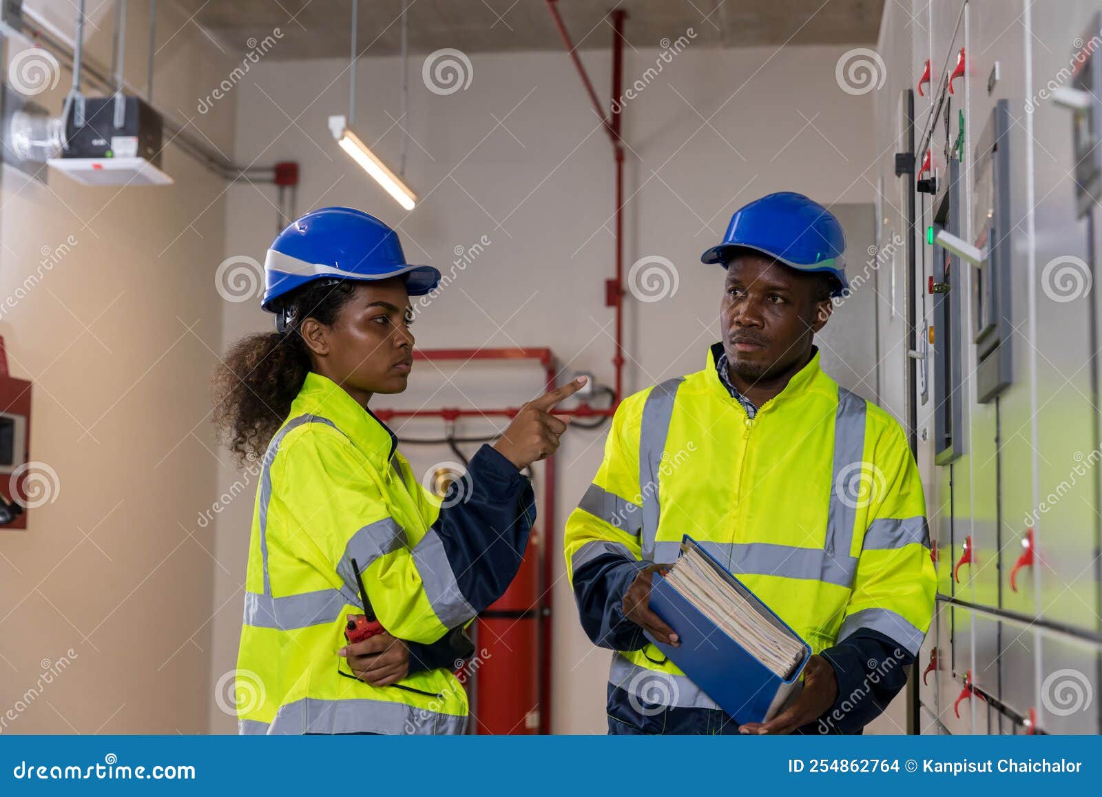 Electrical Engineer Working in Control Room. Electrical Engineer Man ...