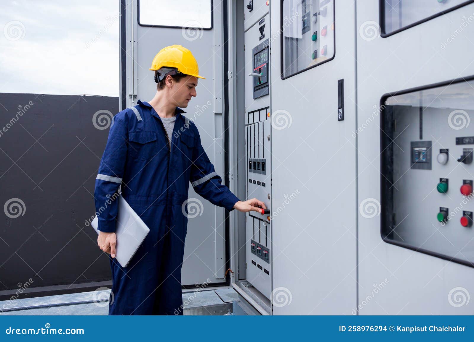Electrical Engineer Working in Control Room. Electrical Engineer Man ...