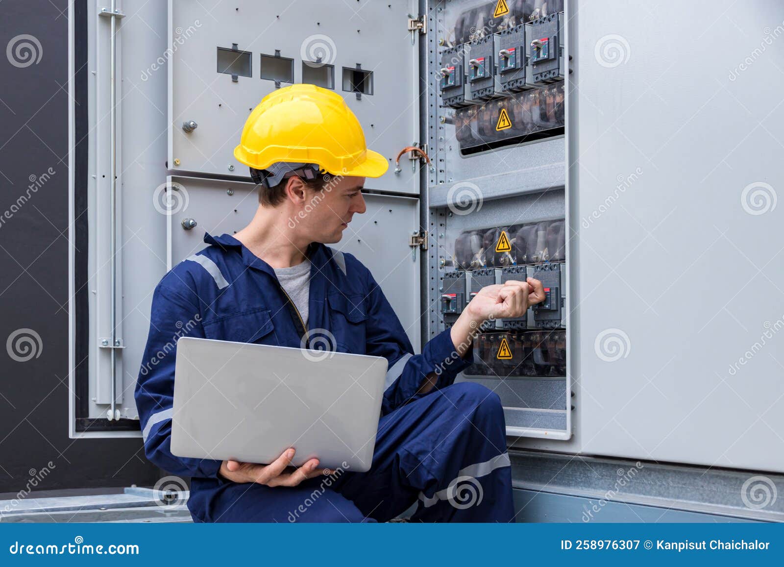 Electrical Engineer Working in Control Room. Electrical Engineer Man ...