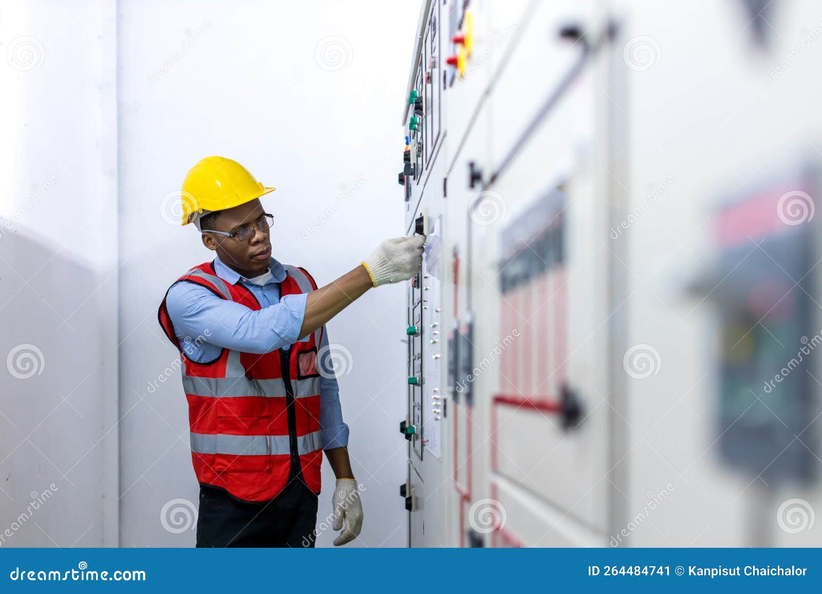 Electrical Engineer Working in Control Room. Electrical Engineer Man ...