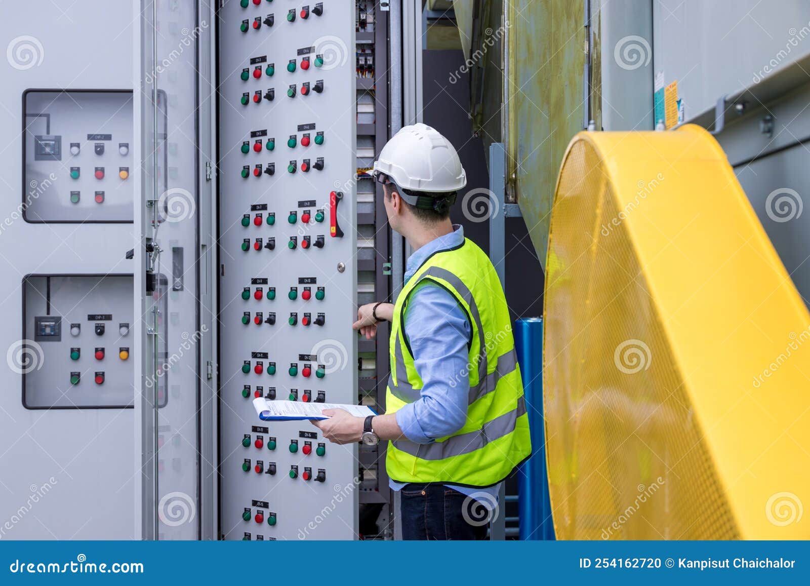 Electrical Engineer Working in Control Room. Electrical Engineer Man ...