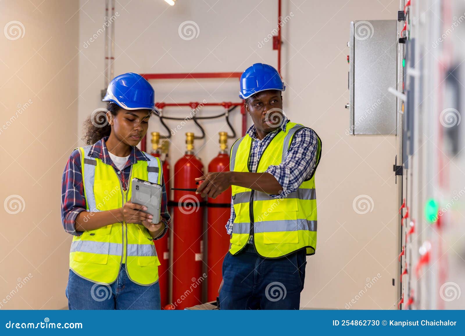 Electrical Engineer Working in Control Room. Electrical Engineer Man ...