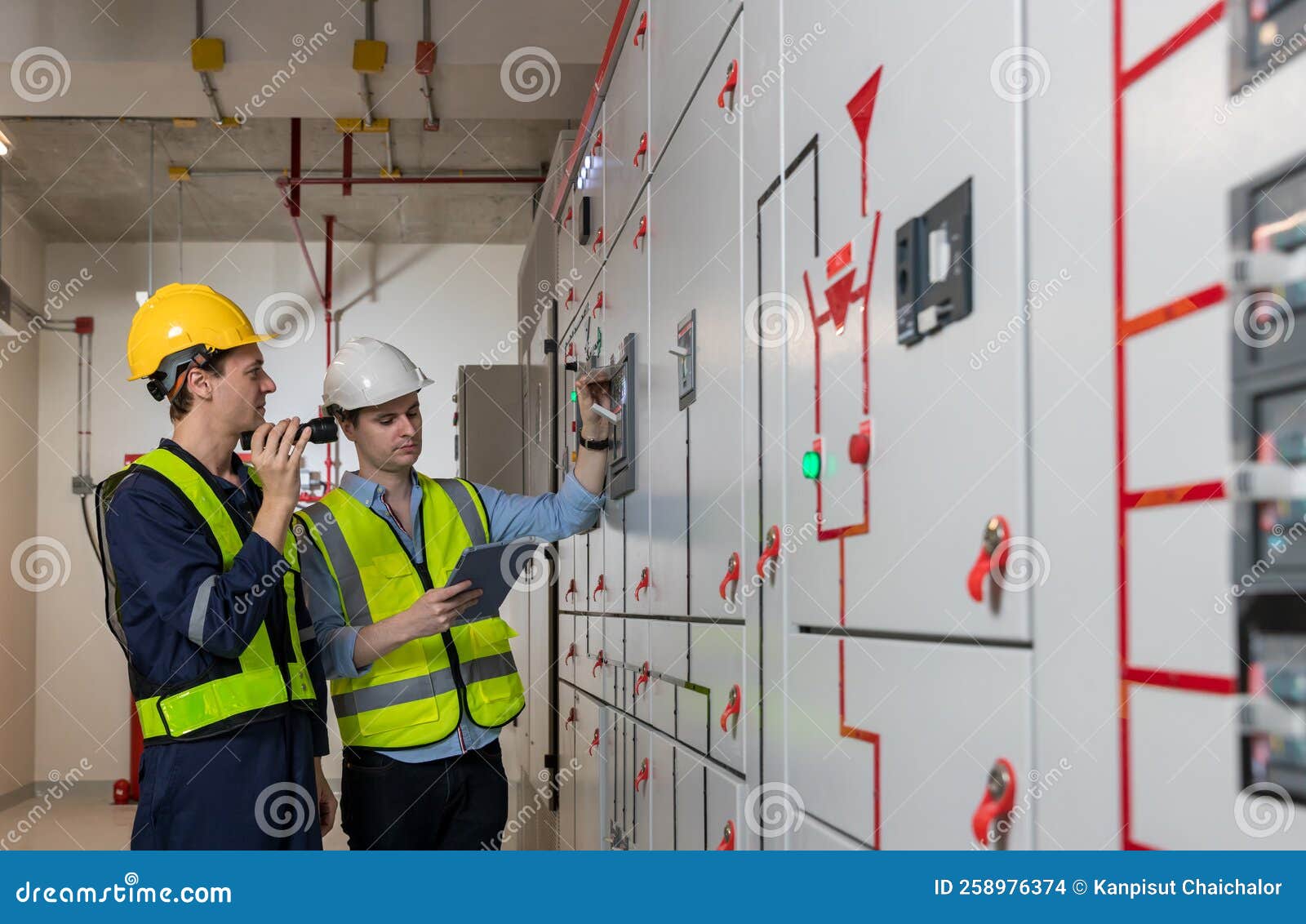 Electrical Engineer Working in Control Room. Electrical Engineer Man ...
