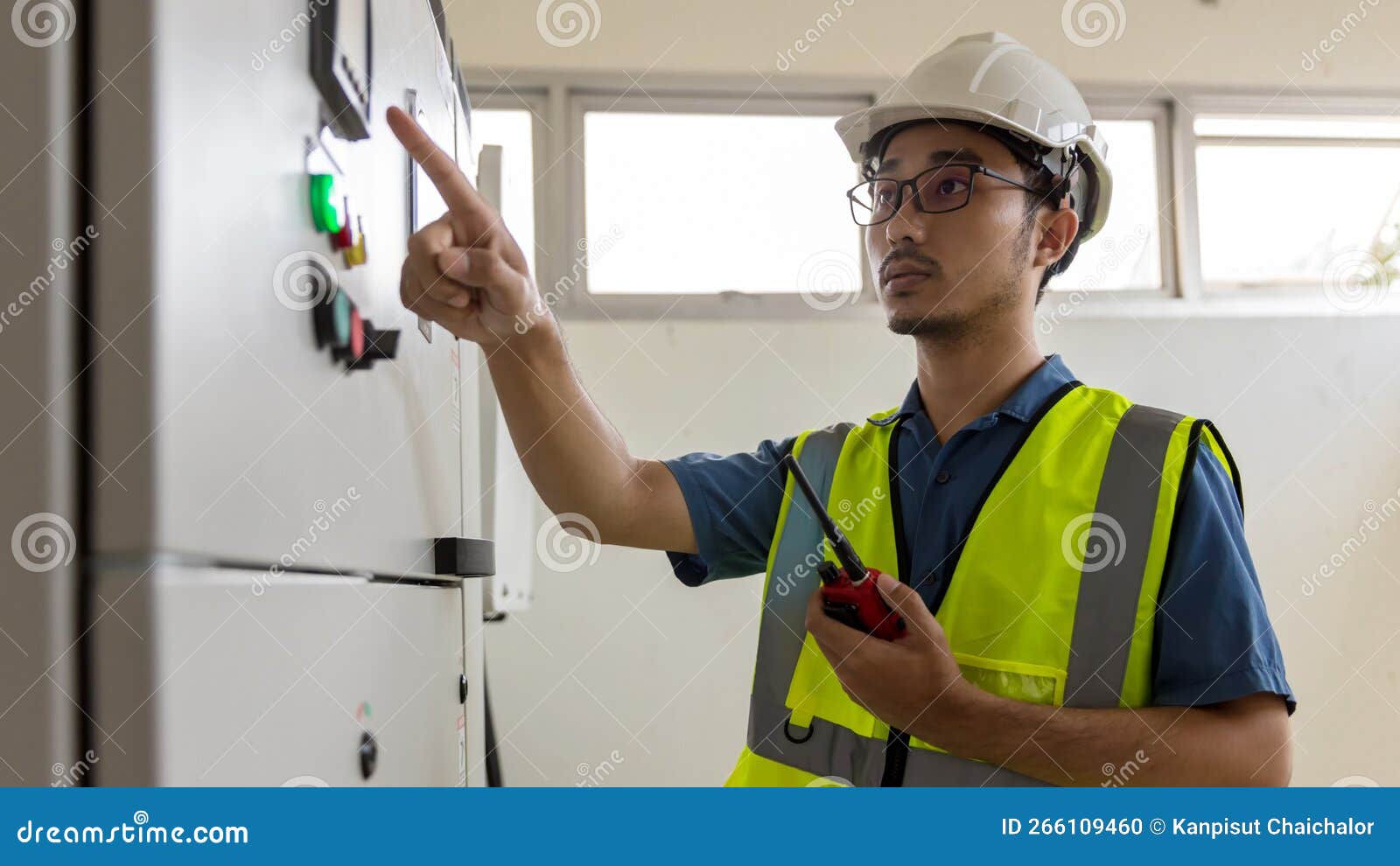 Electrical Engineer Working in Control Room. Electrical Engineer Man ...