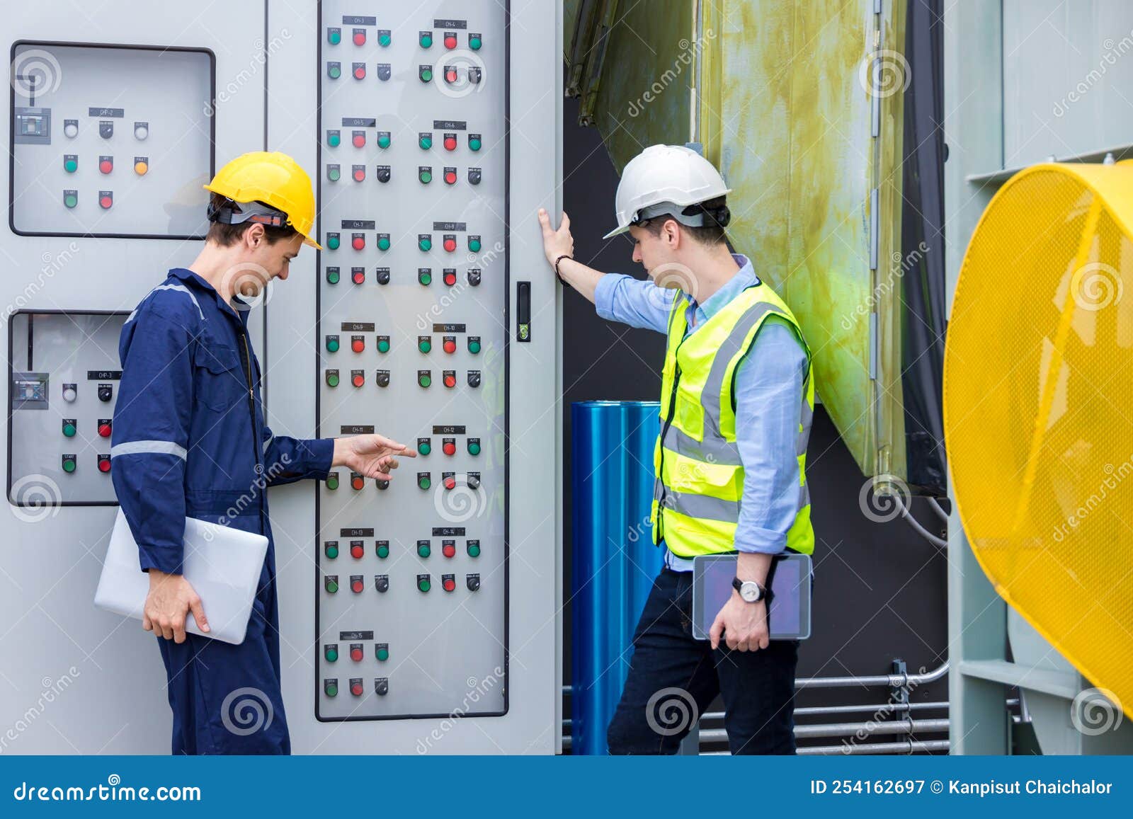 Electrical Engineer Working in Control Room. Electrical Engineer Man ...