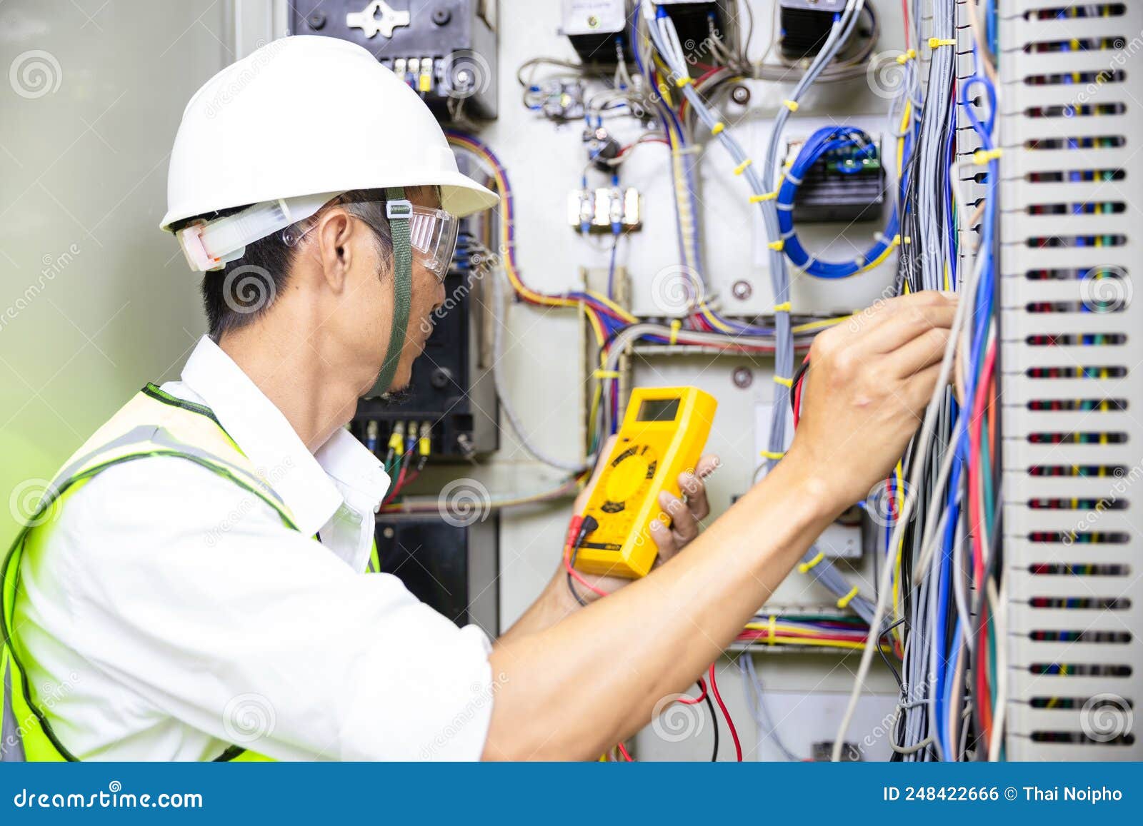 Electrical engineering man stock photo. Image of cable - 248422666