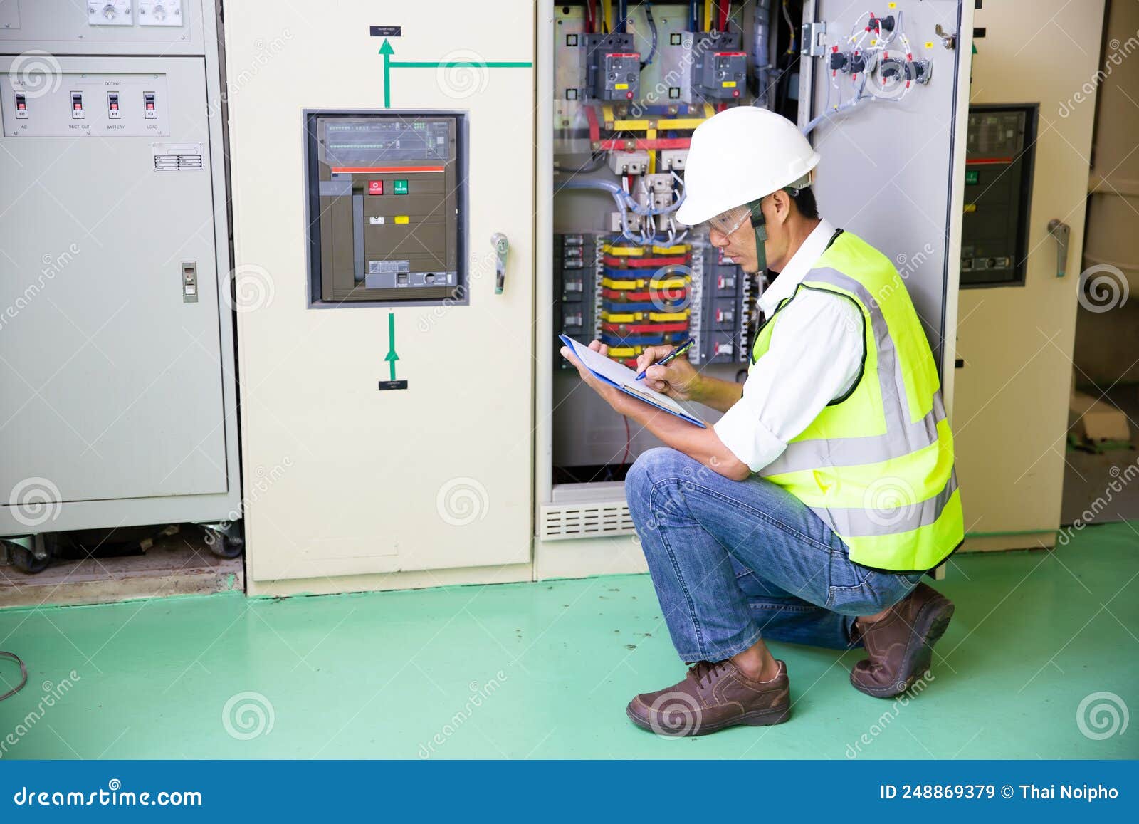 Electrical engineering man stock image. Image of installing - 248869379