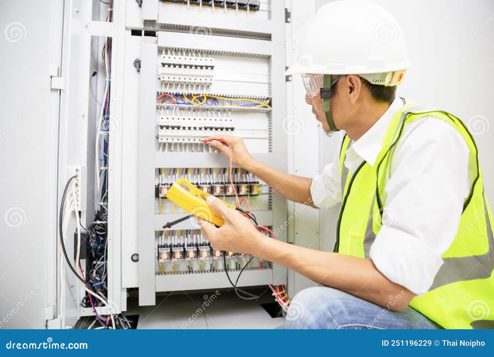 Electrical engineering man stock image. Image of fuse - 251196229