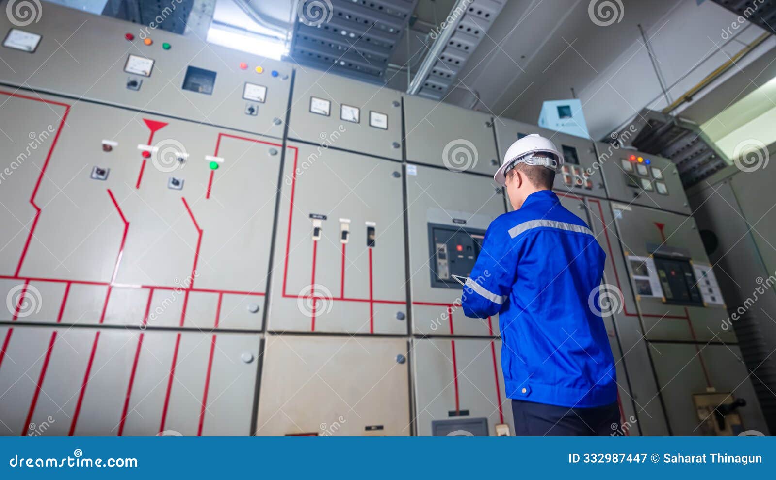 Electrical Engineers Check the Operation of the Main Electrical Control ...