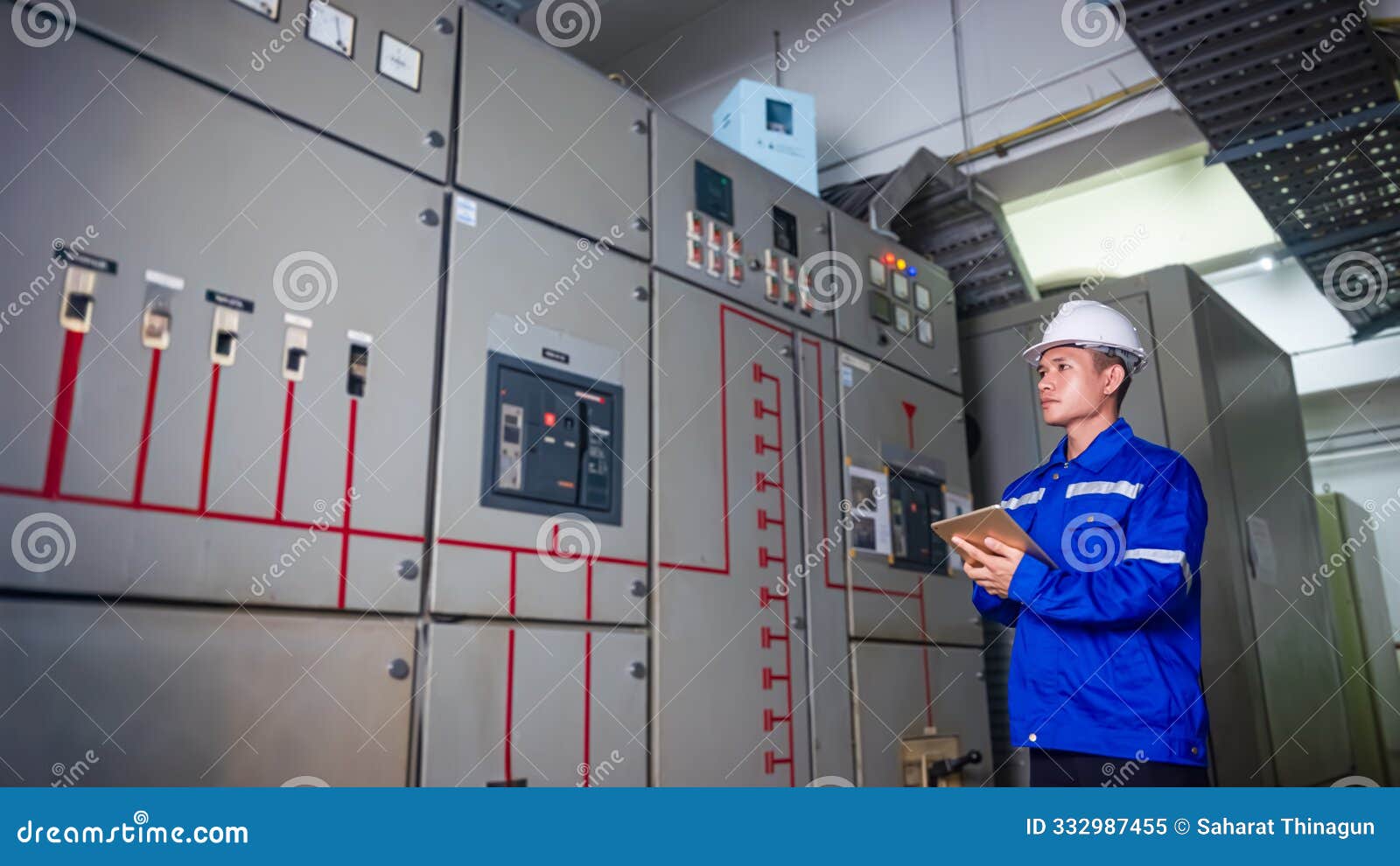 Electrical Engineers Check the Operation of the Main Electrical Control ...