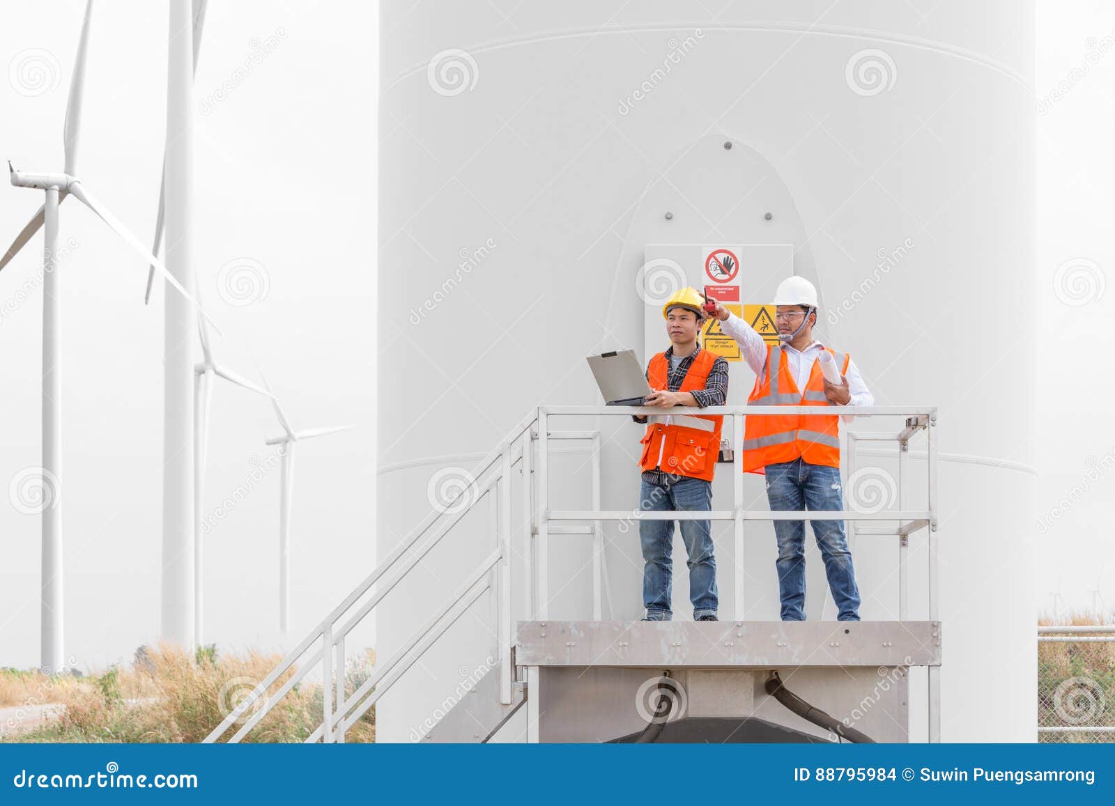 Two Engineers In A Wind Turbine Power Station Royalty-Free Stock Photo ...