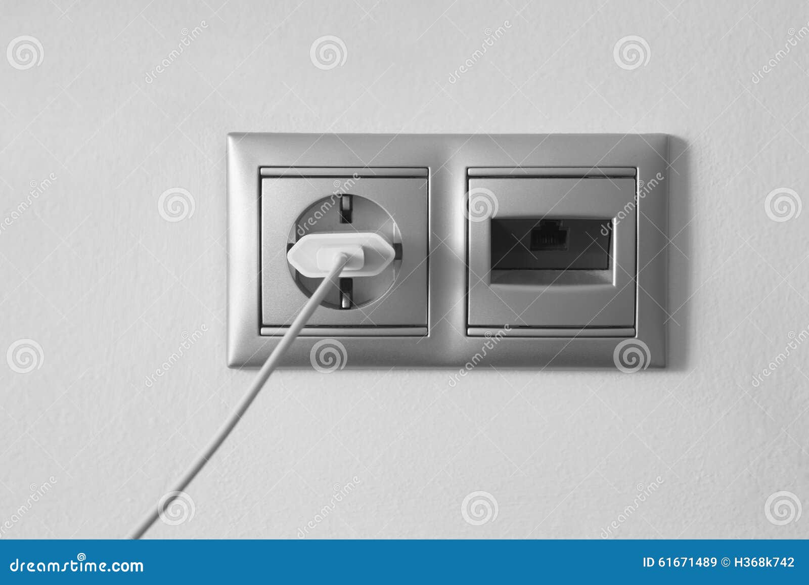 Electrical and Ethernet Socket on a Textured White Wall Stock Image ...