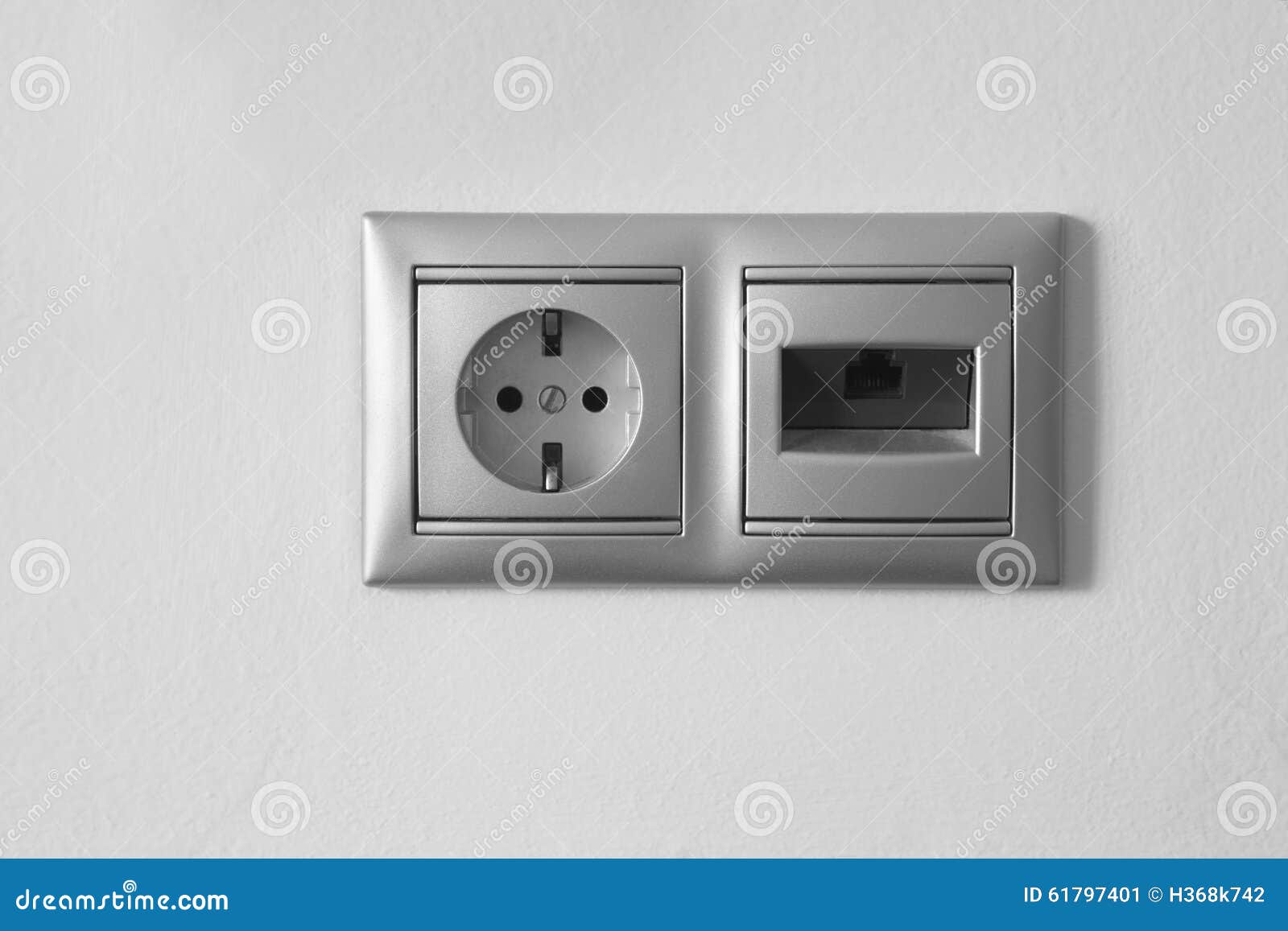 Electrical and Ethernet Socket on a Textured White Wall Stock Image ...