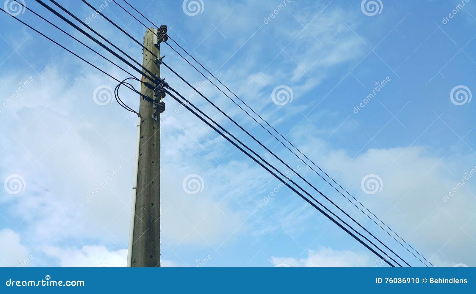 Electrical High Tension Lines Against Blue Sky. Stock Photo - Image of ...