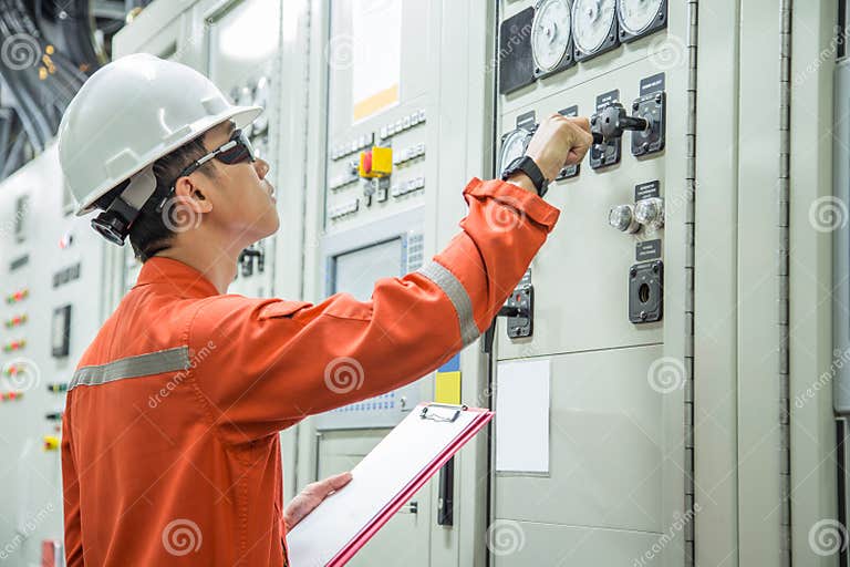 Electrical and Instrument Technician Checking Electricity System. Stock ...