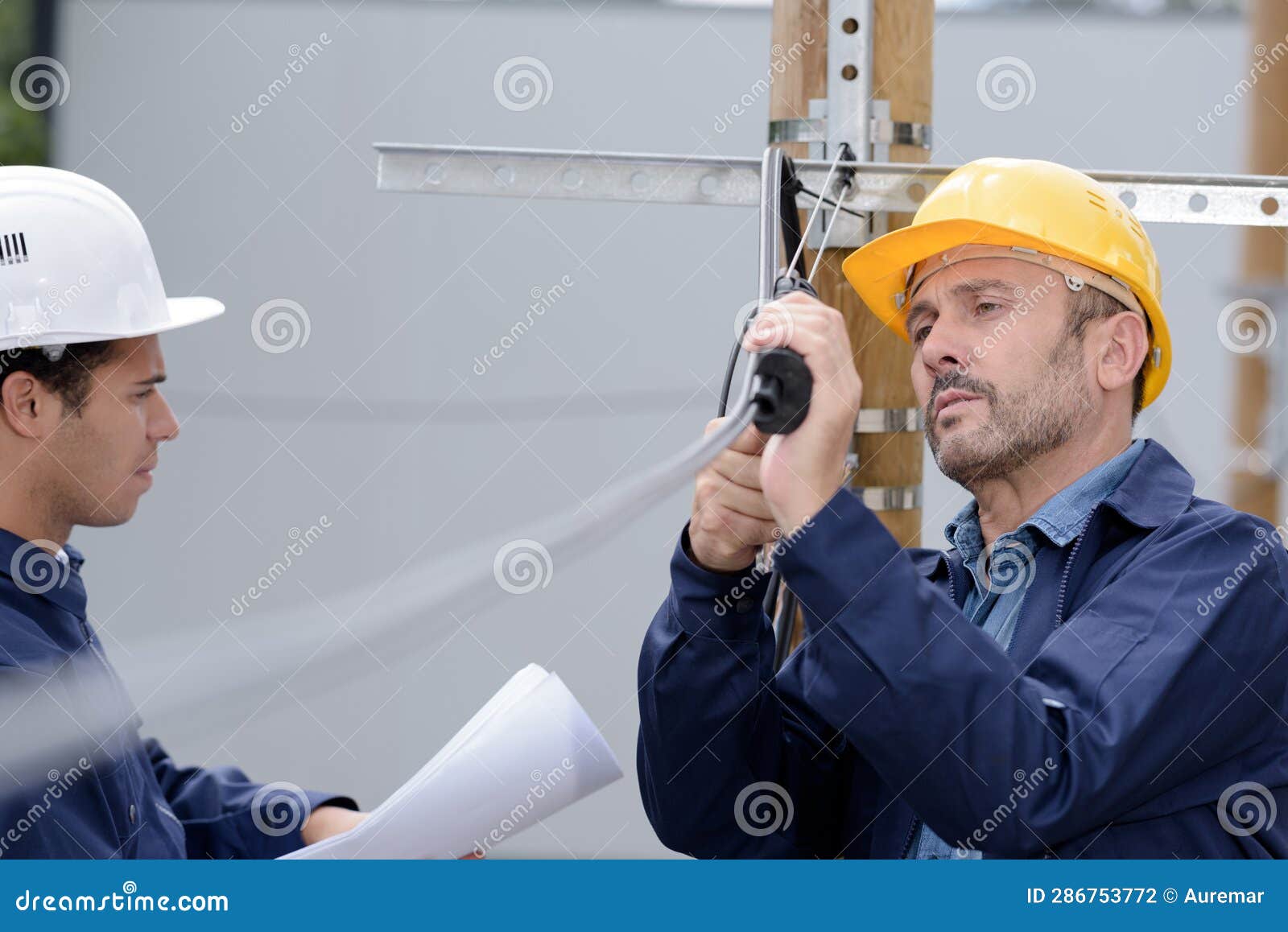 Electrical Line Apprentice Observing Teachers Demonstration Stock Photo ...