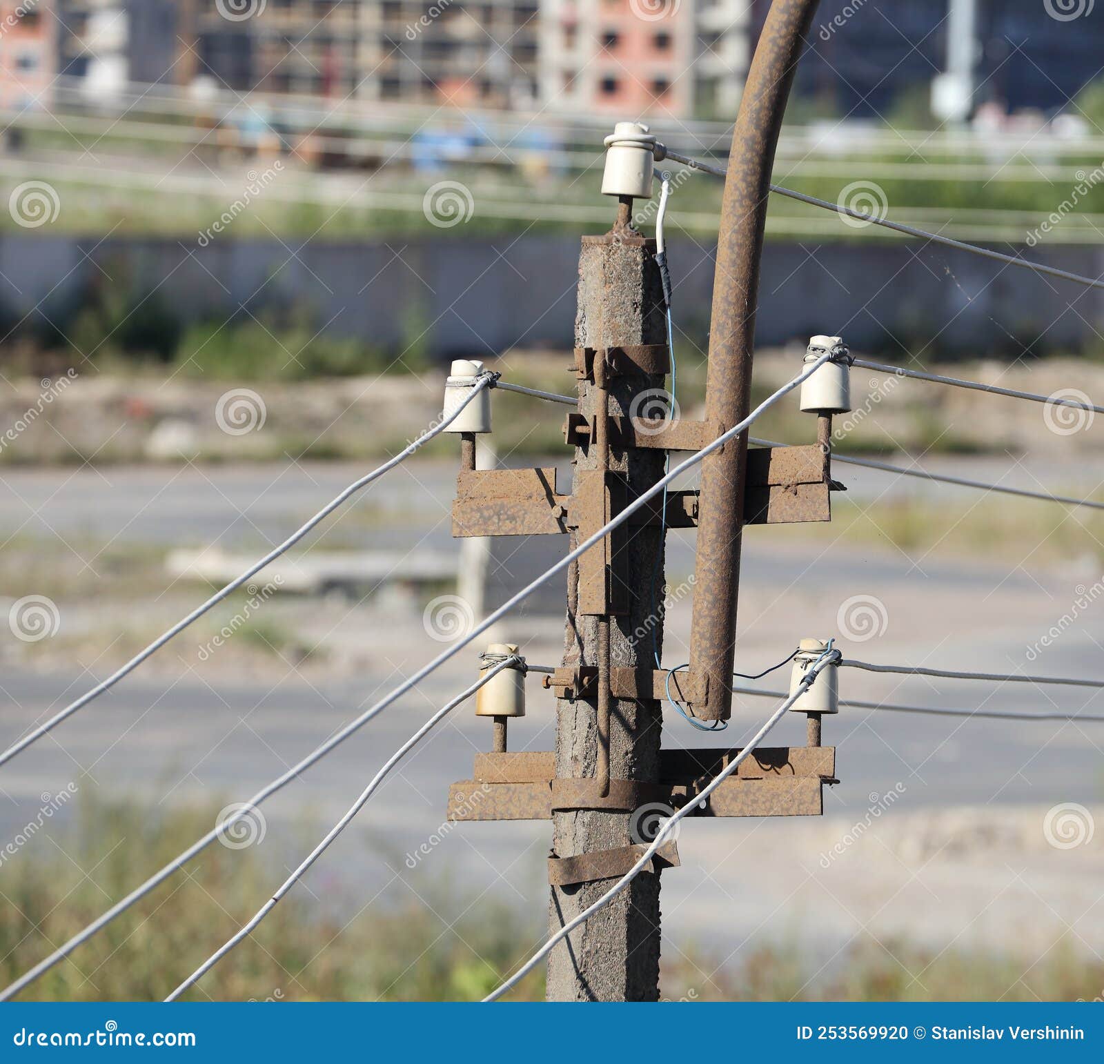 Electrical Line Passes through an Old Rusty Pole Stock Photo - Image of ...
