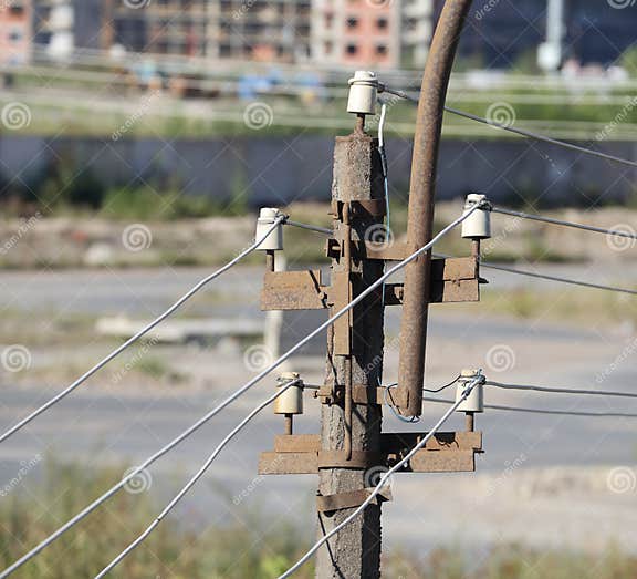 Electrical Line Passes through an Old Rusty Pole Stock Photo - Image of ...