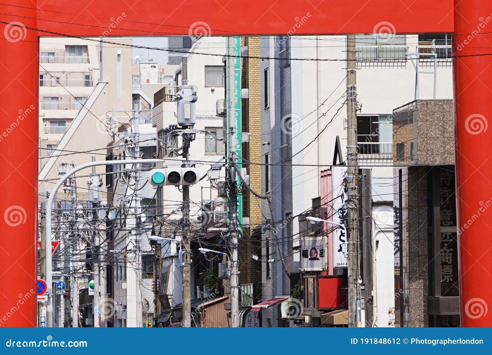 Electrical Lines and Street Light Seen through Torii Gate Editorial ...