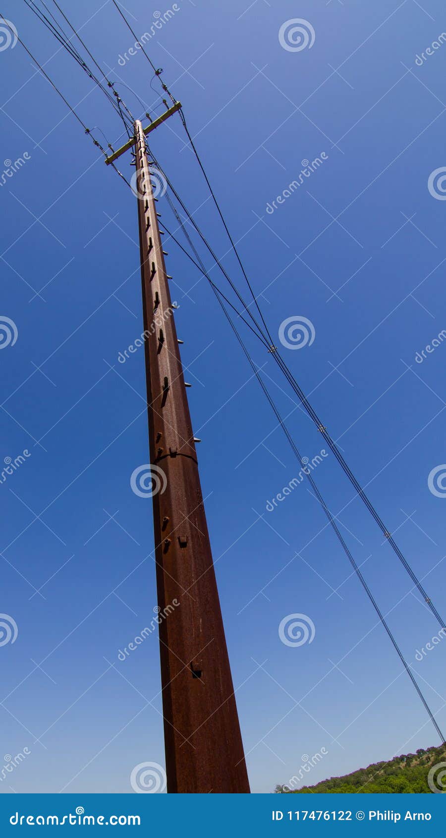 Rusted Utility Pole with Electrical Wire High Over Head Stock Photo ...