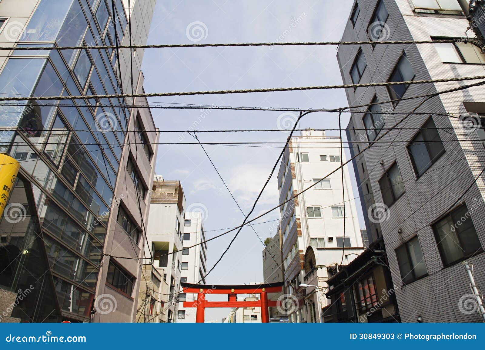 Electrical Lines and Torii Gate between Multistory Buildings Editorial ...