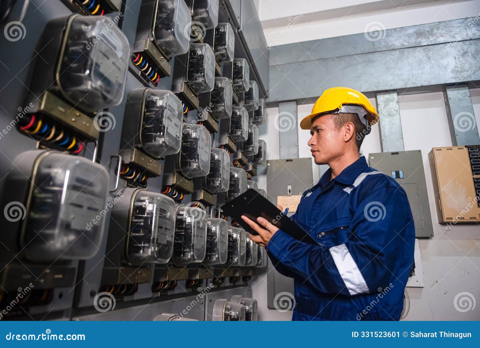 Electrical Maintenance Engineer is Checking .Electricity Meter, Main ...