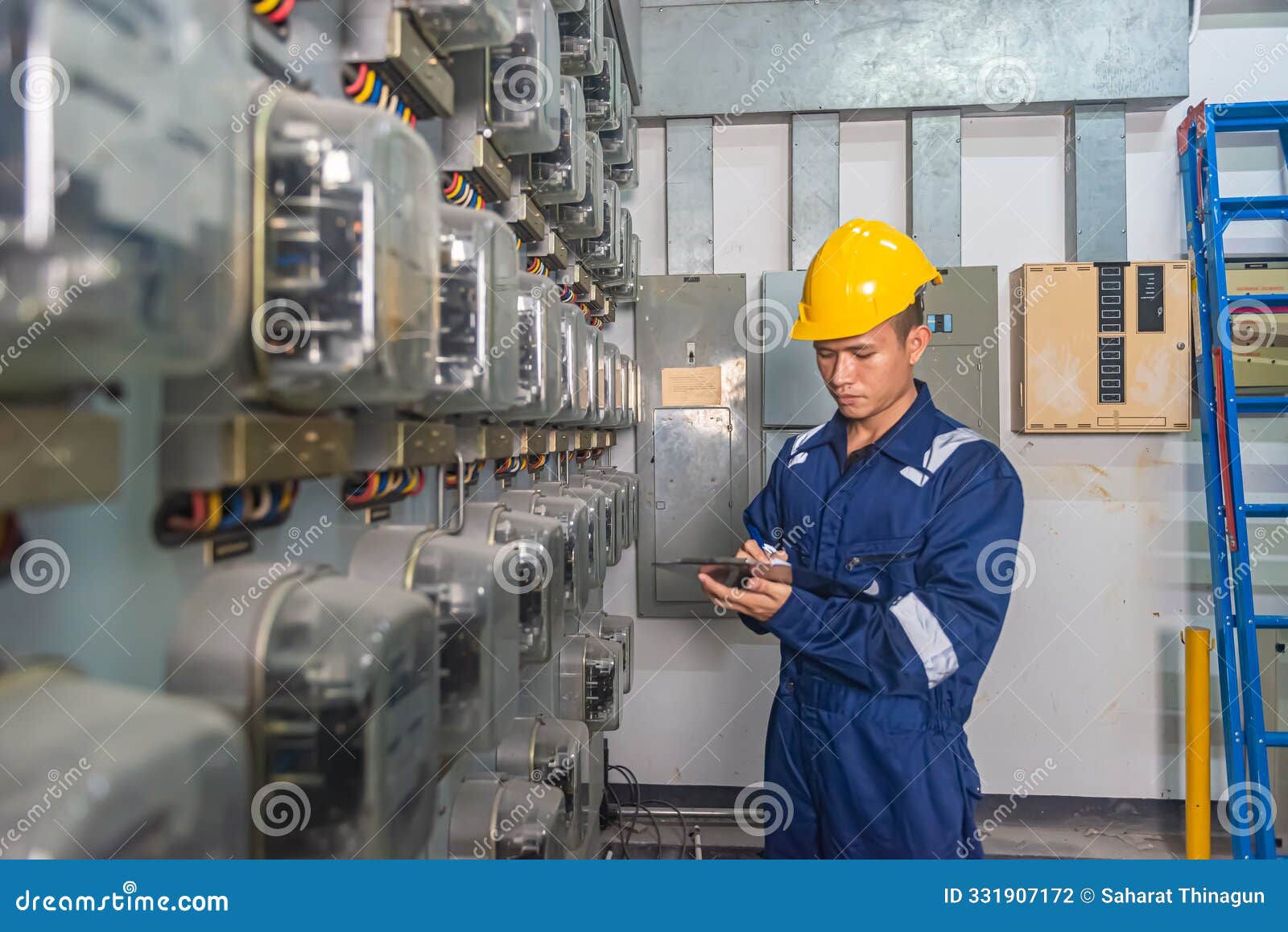 Electrical Maintenance Engineer is Checking .Electricity Meter, Main ...