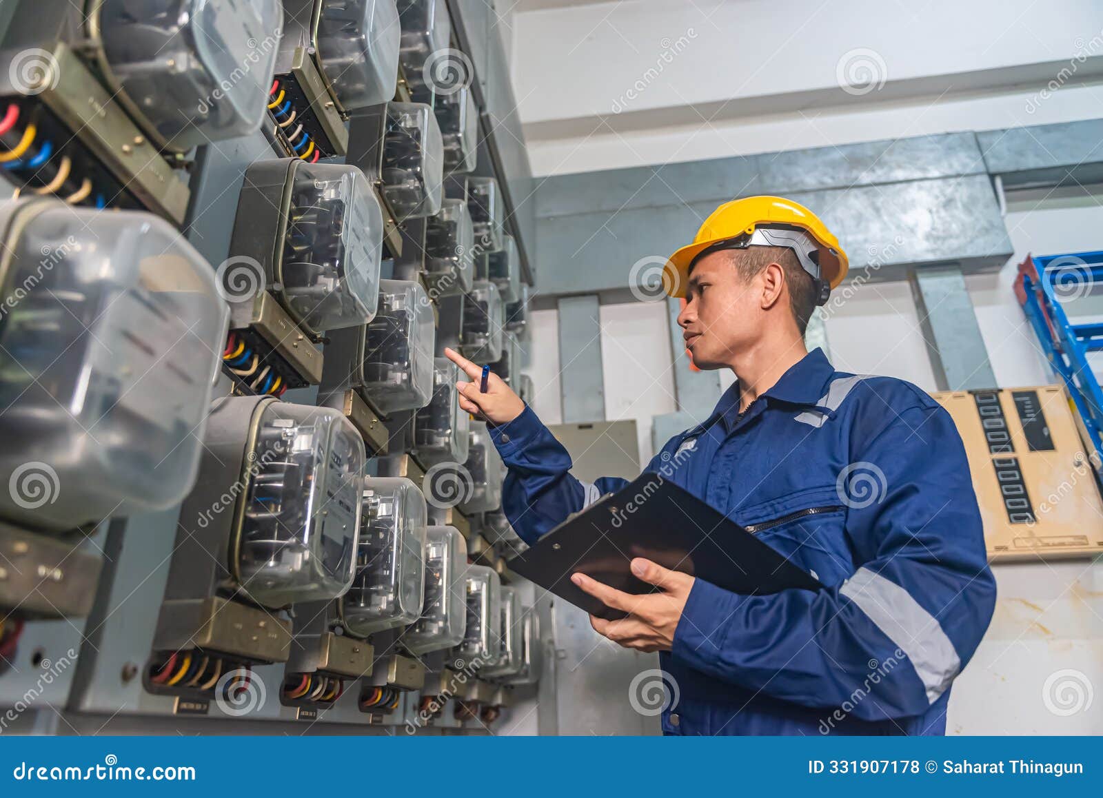 Electrical Maintenance Engineer is Checking .Electricity Meter, Main ...