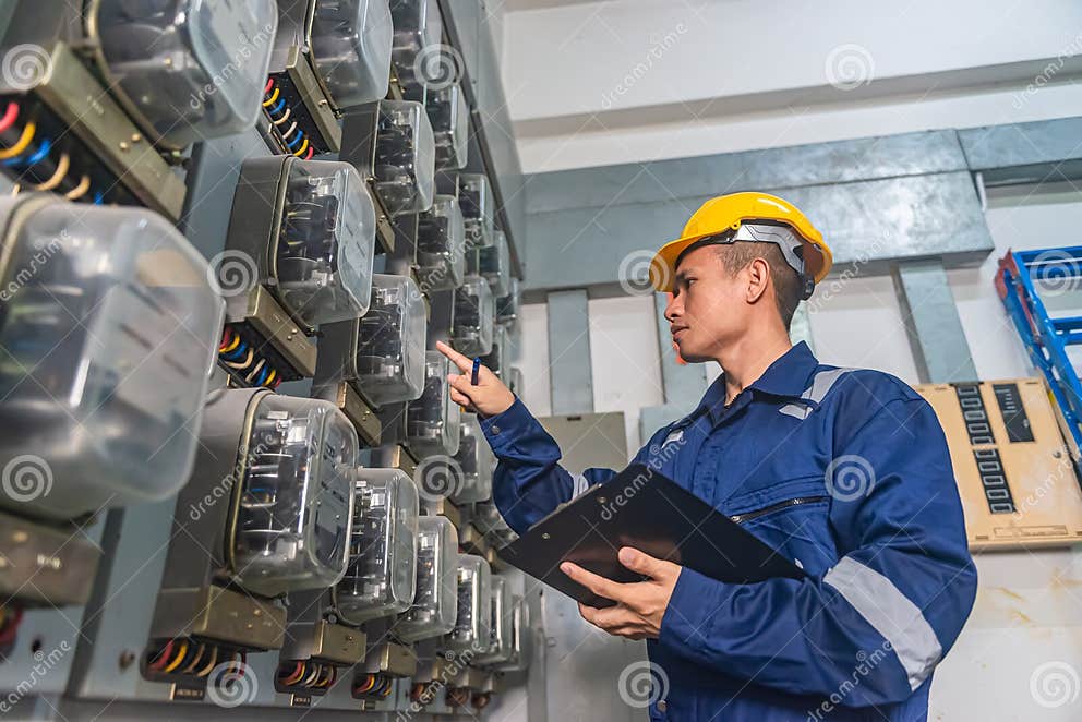 Electrical Maintenance Engineer is Checking .Electricity Meter, Main ...