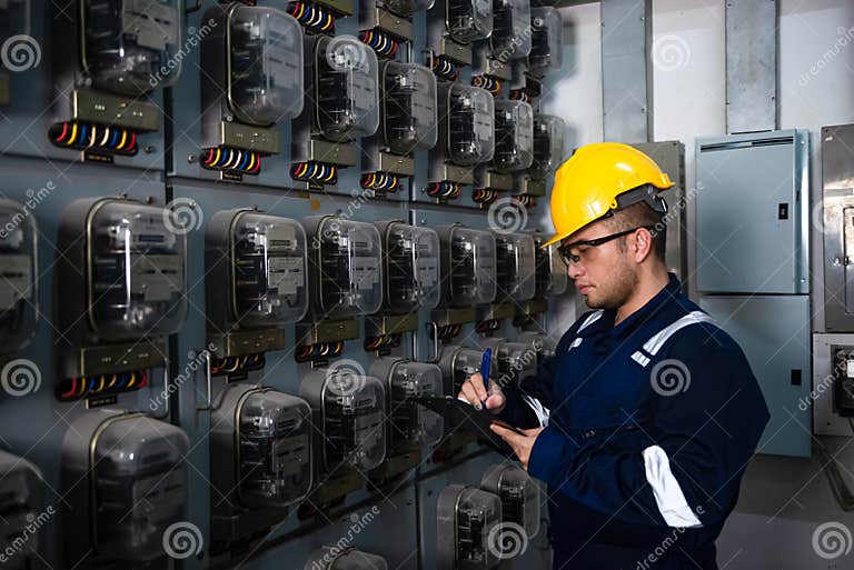 Electrical Maintenance Engineer is Checking .Electricity Meter, Main ...