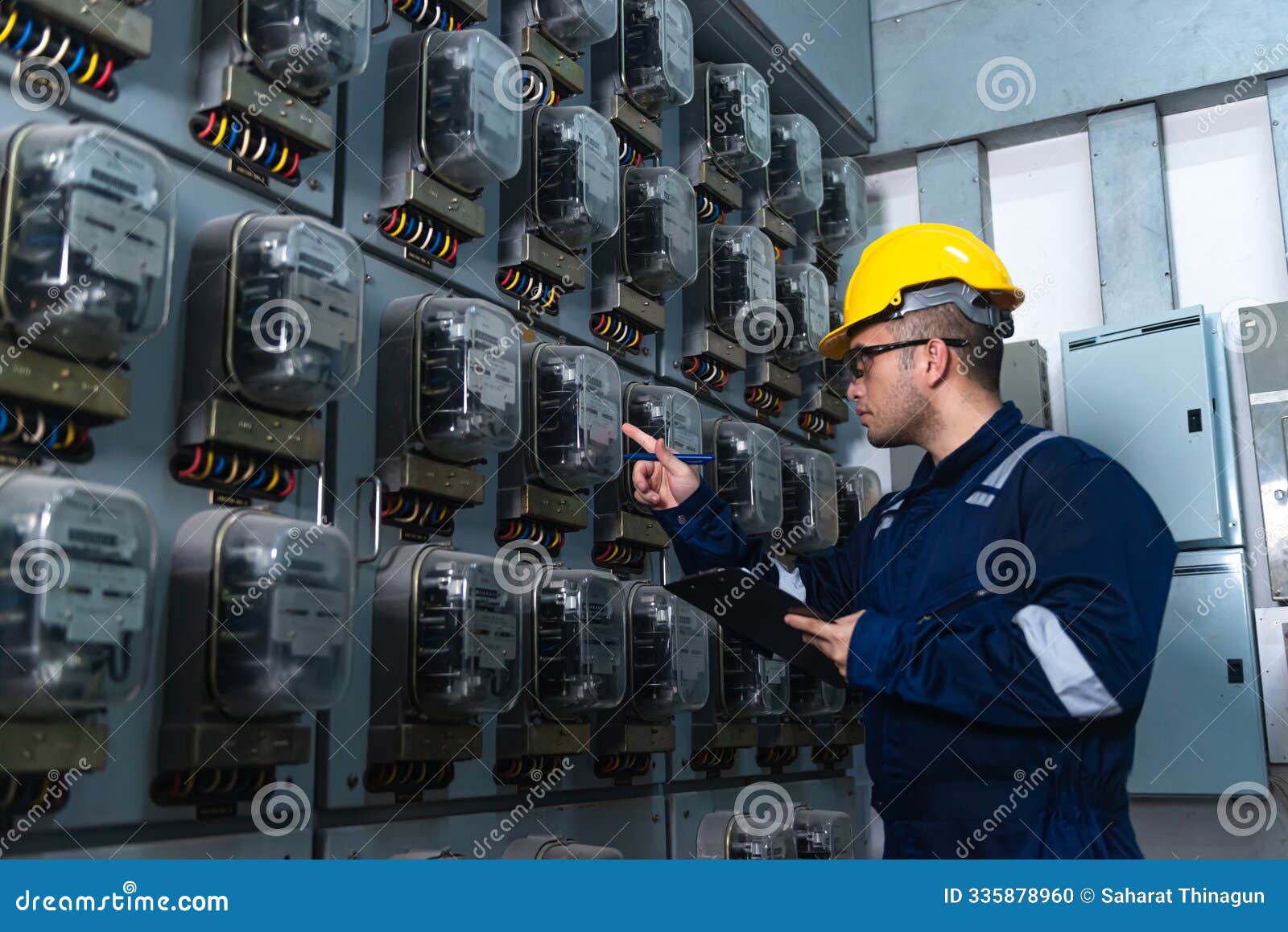 Electrical Maintenance Engineer is Checking .Electricity Meter, Main ...
