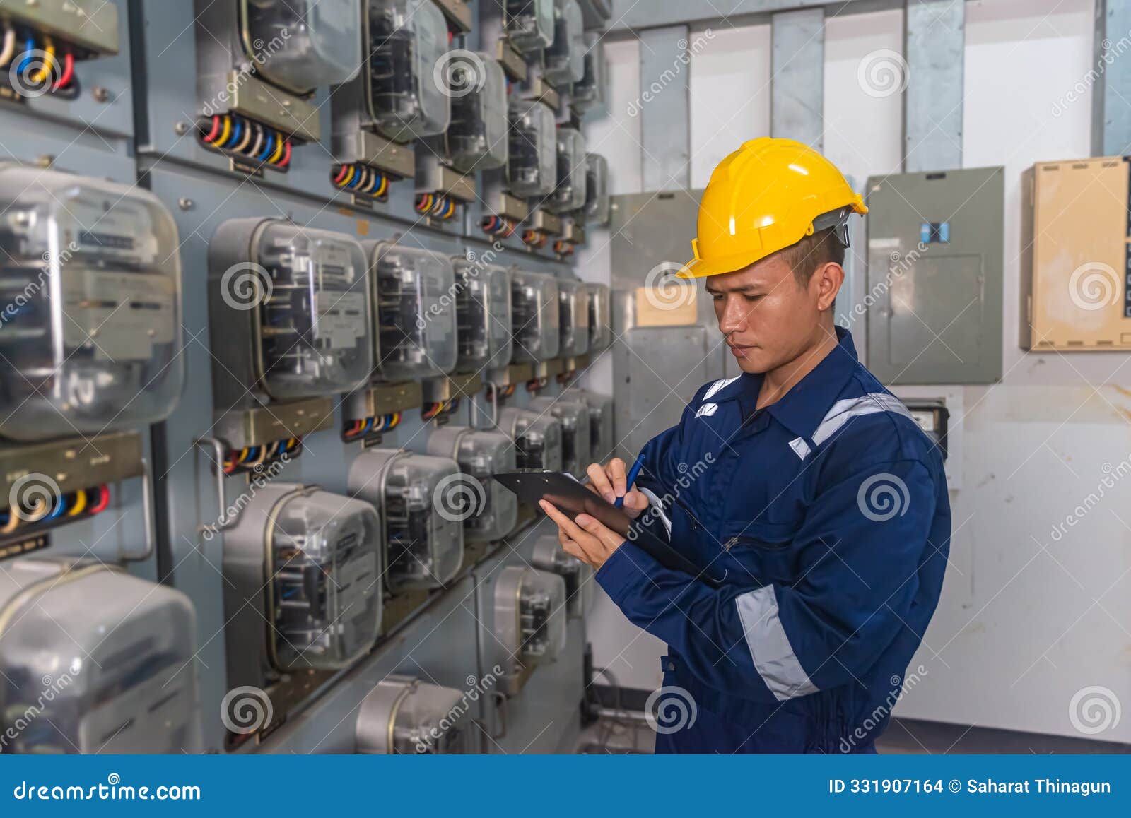Electrical Maintenance Engineer is Checking .Electricity Meter, Main ...