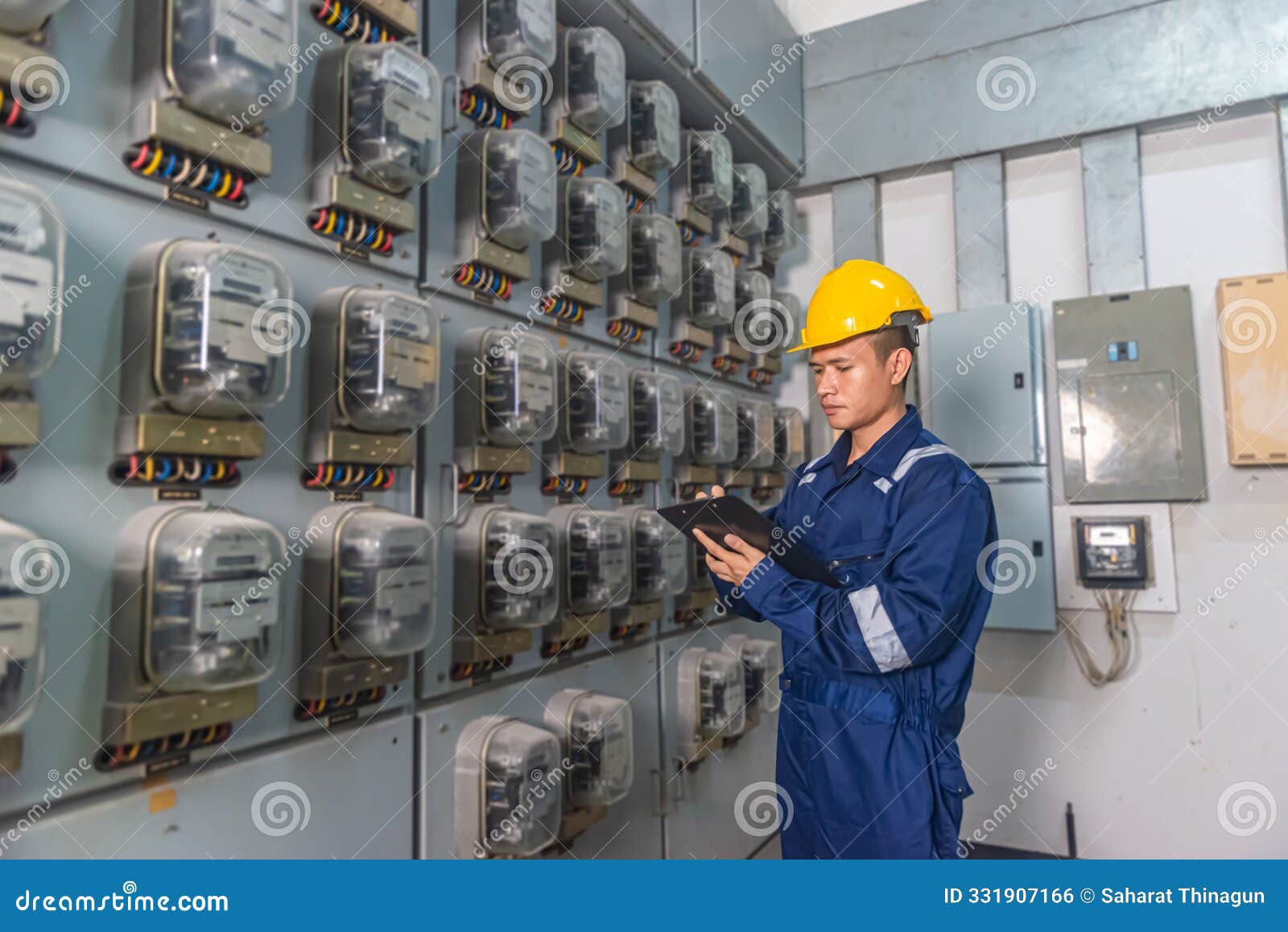 Electrical Maintenance Engineer is Checking .Electricity Meter, Main ...