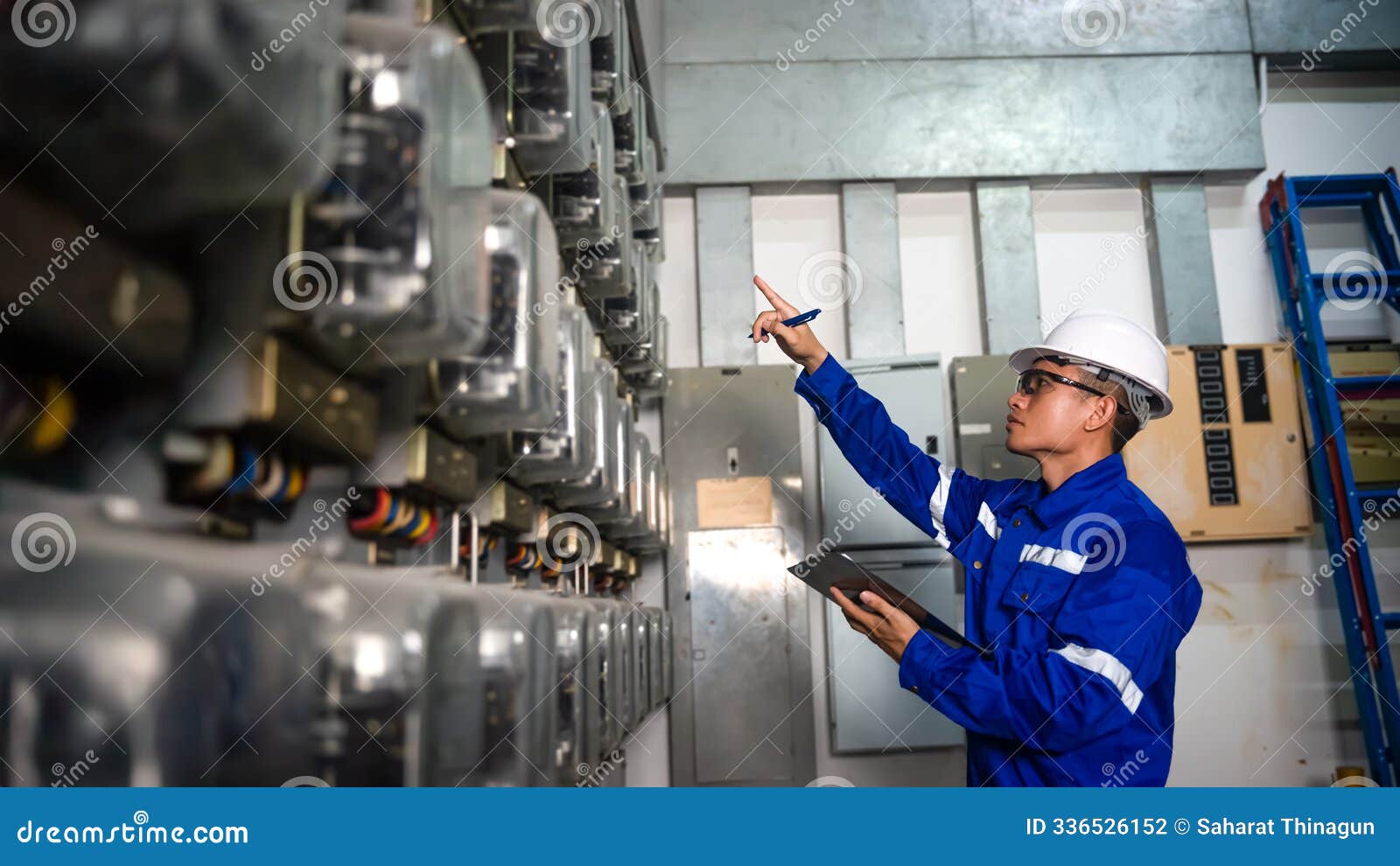 Electrical Maintenance Engineer is Checking .Electricity Meter, Main ...