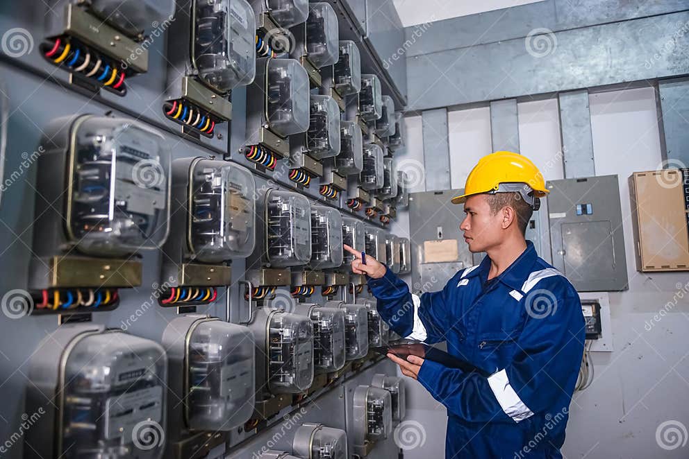 Electrical Maintenance Engineer is Checking .Electricity Meter, Main ...