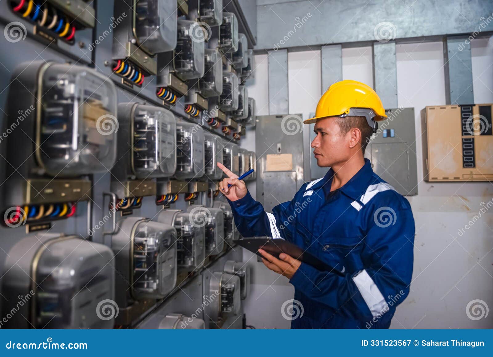 Electrical Maintenance Engineer is Checking .Electricity Meter, Main ...