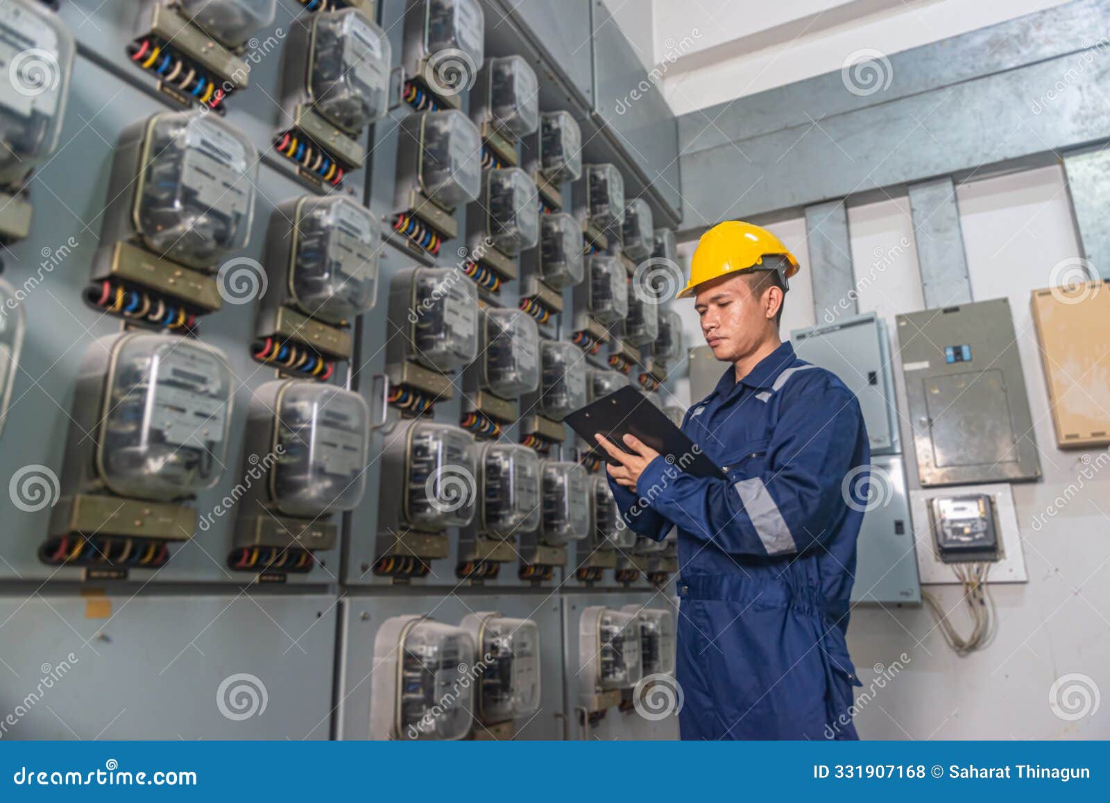 Electrical Maintenance Engineer is Checking .Electricity Meter, Main ...