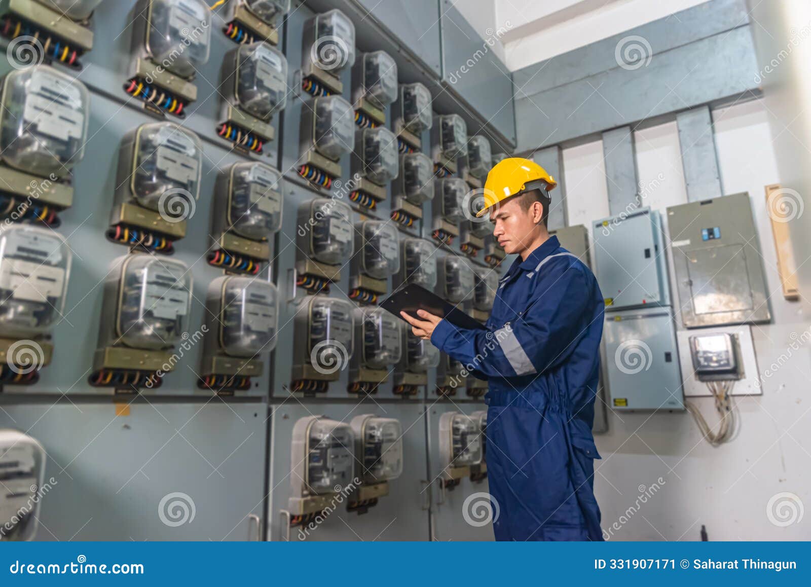 Electrical Maintenance Engineer is Checking .Electricity Meter, Main ...