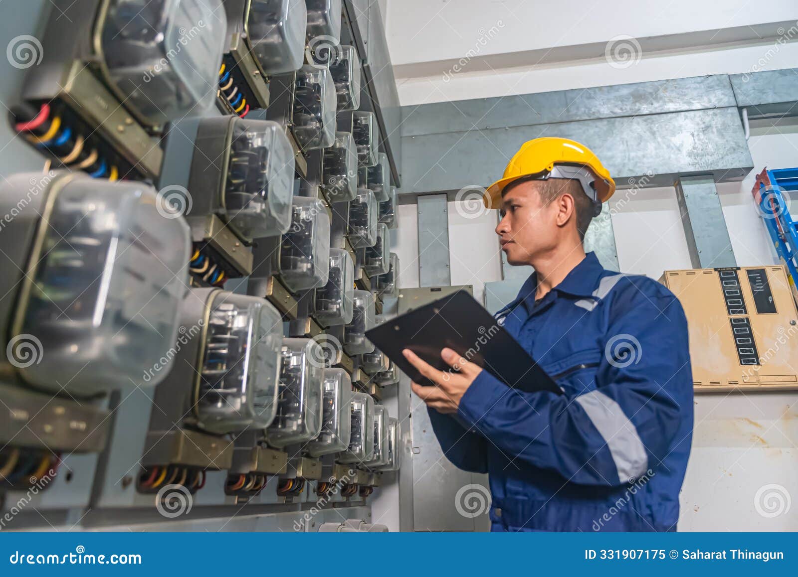 Electrical Maintenance Engineer is Checking .Electricity Meter, Main ...