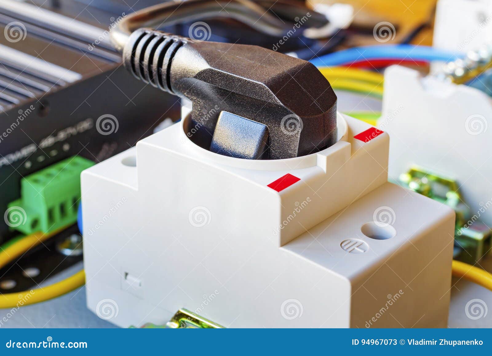 Electrical Outlet with Power Plug Installed on the DIN Rail Stock Image ...