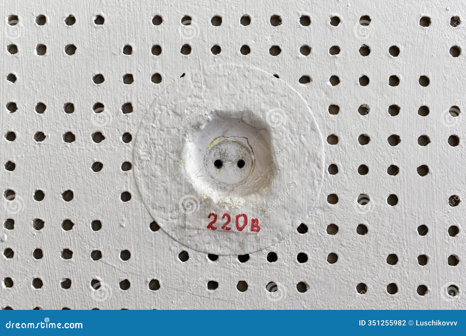 An Electrical Outlet in the Wall. a Wall with Holes Stock Photo - Image ...