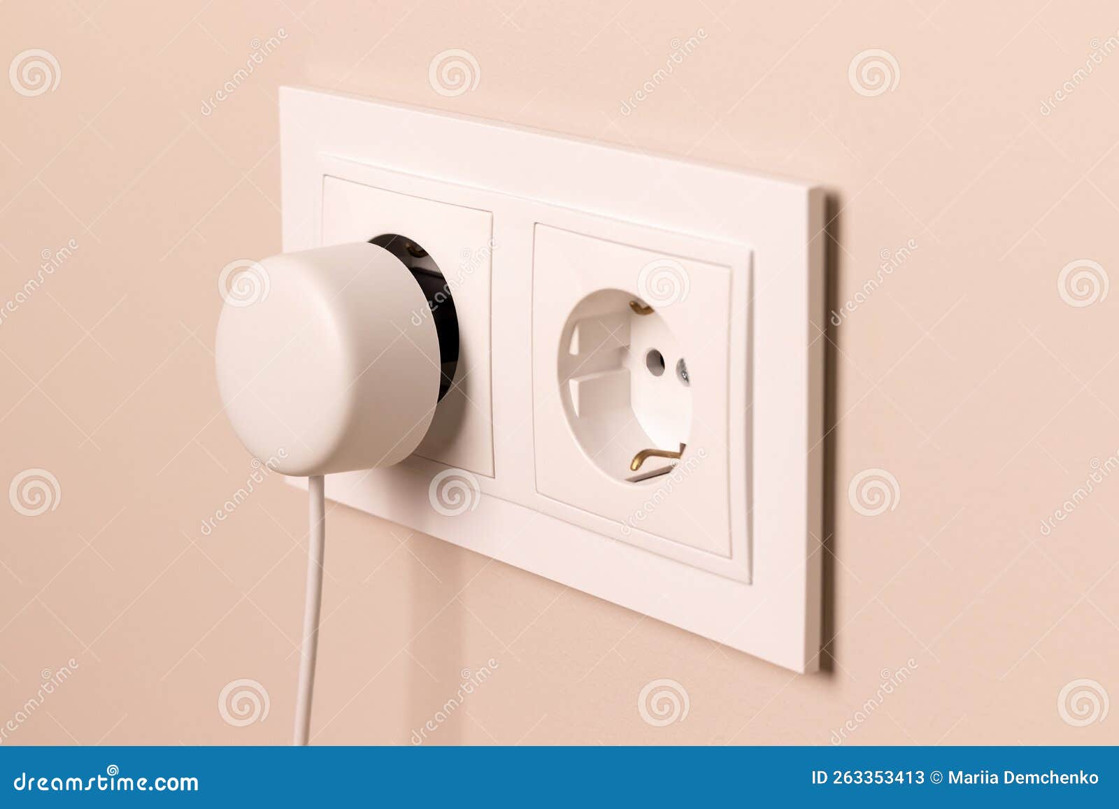Electrical Outlets with Plug on Beige Wall Stock Image - Image of save ...