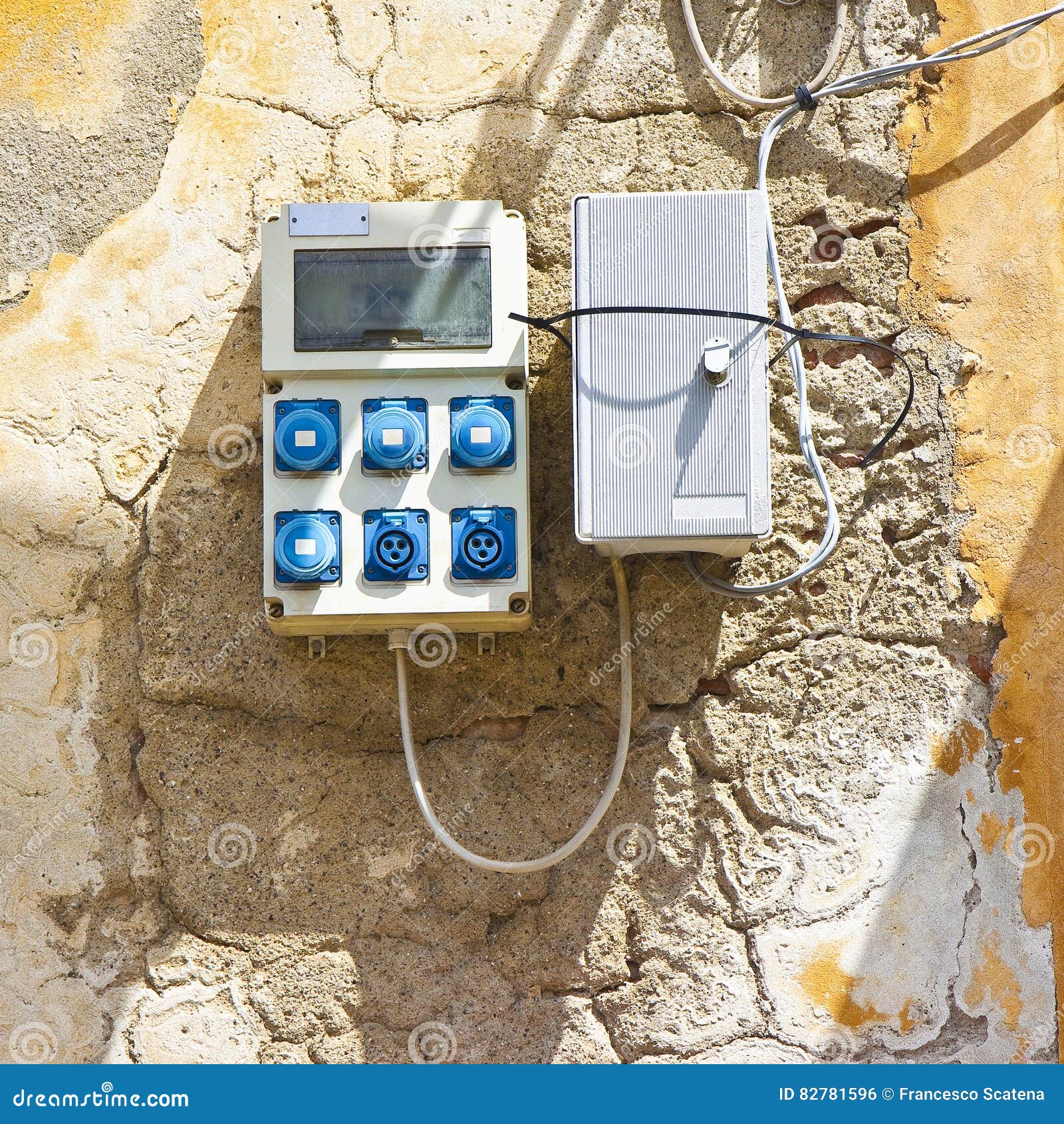 Electrical Panel Hanging from a Damaged Plaster Wall Stock Photo ...