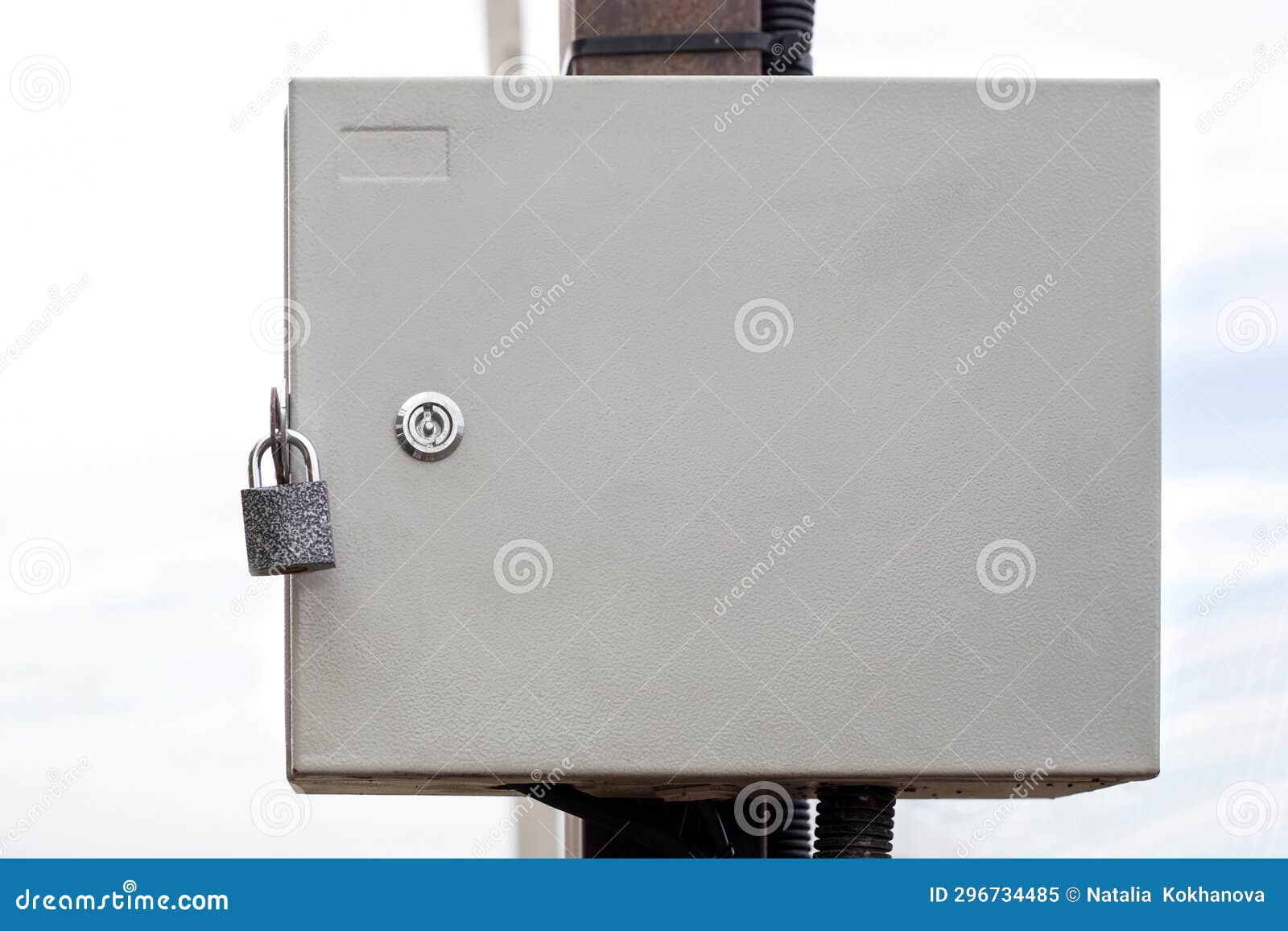 An Electrical Panel in an Iron Box, Locked and Hanging on a Pole. Input ...
