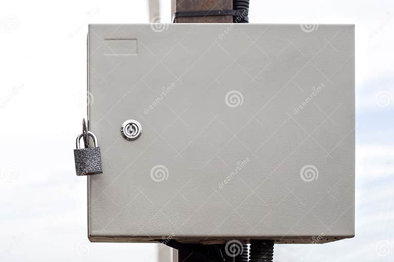 An Electrical Panel in an Iron Box, Locked and Hanging on a Pole. Input ...