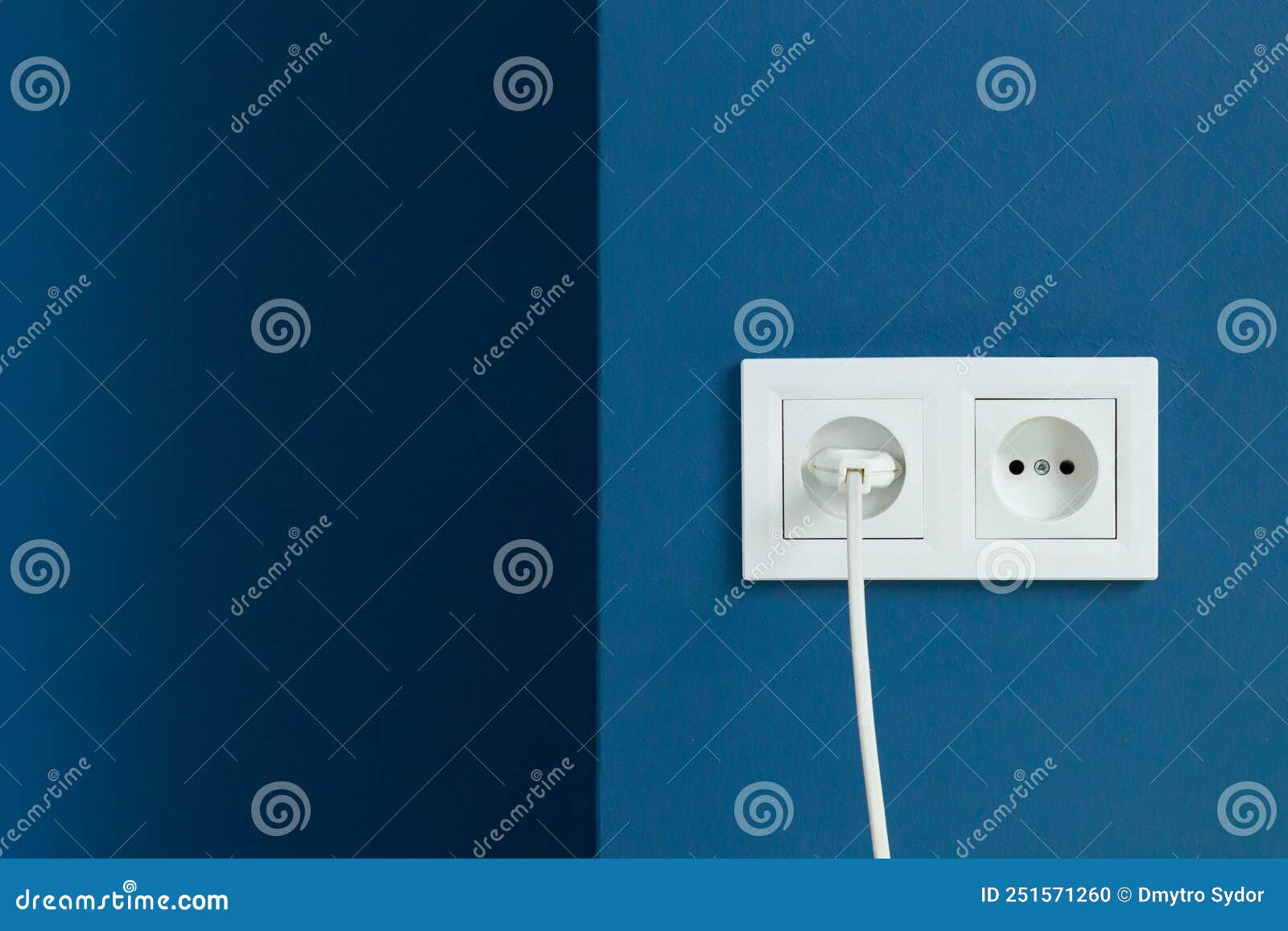 Electrical Plug in Electric Double Socket on Wall Stock Photo - Image ...