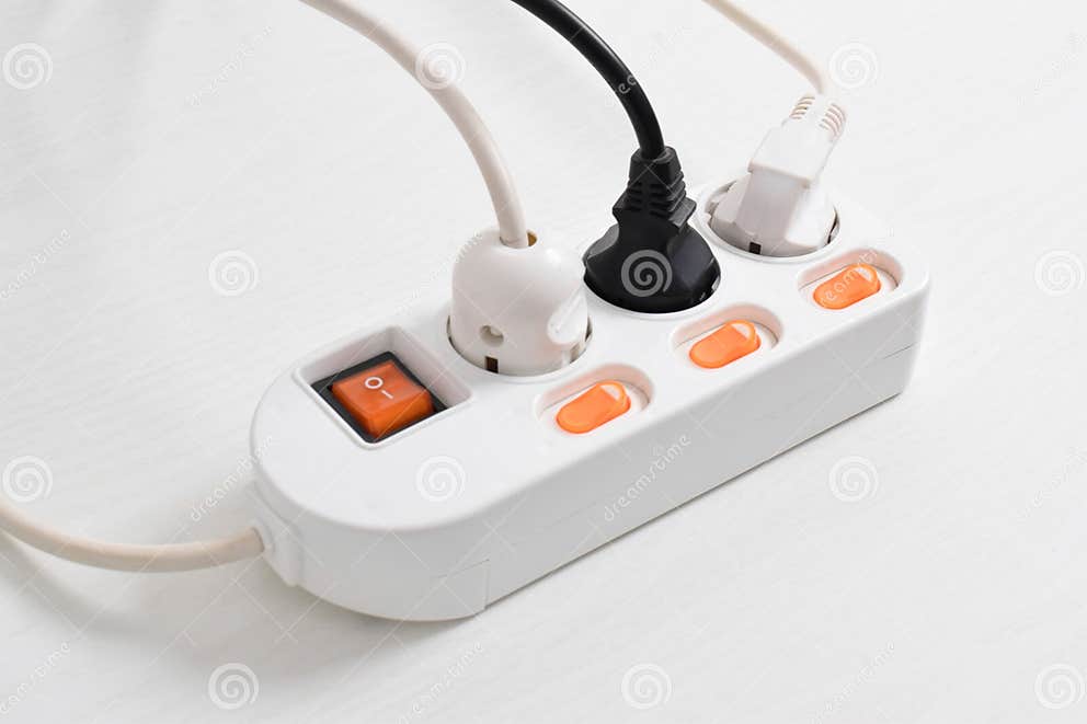 Electrical Plug in Outlet Socket at Home Isolated on White Background ...