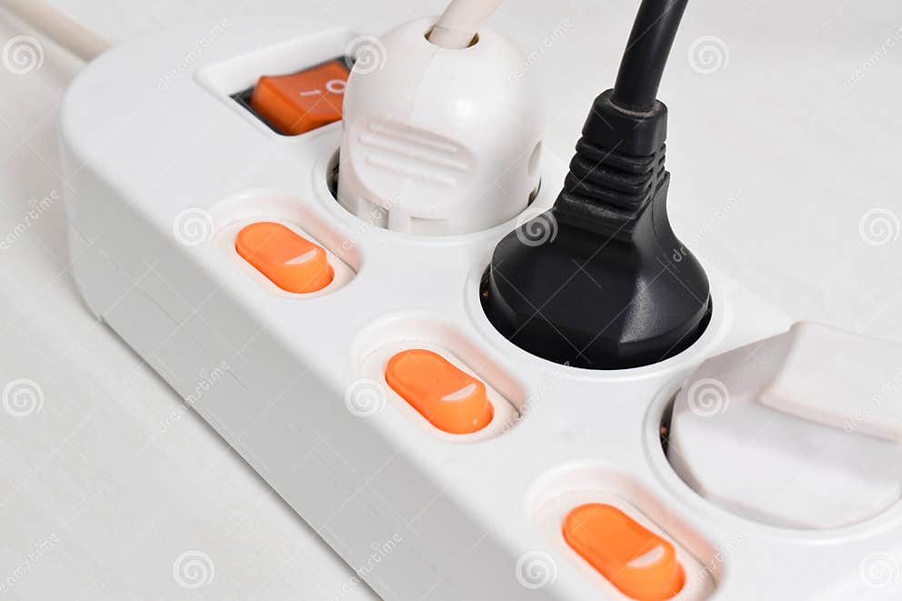 Electrical Plug in Outlet Socket at Home Isolated on White Background ...