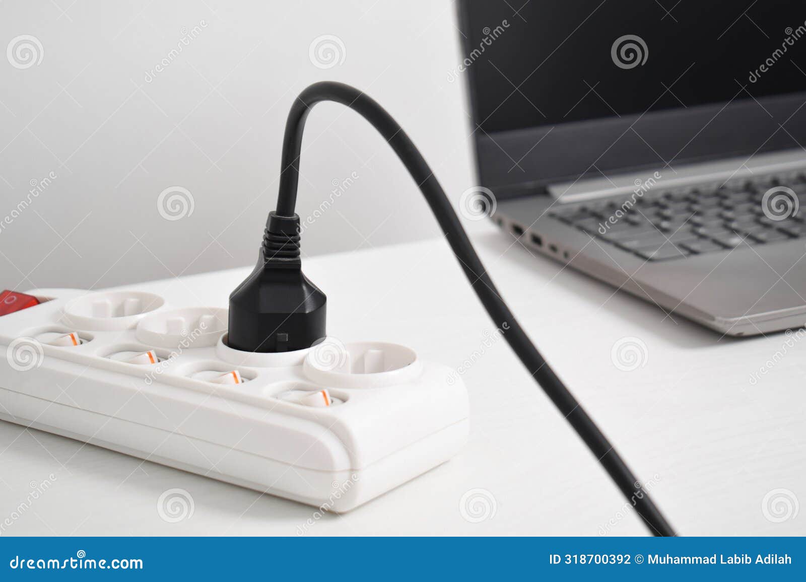 Electrical Plug in Outlet Socket at Home. Electric Plug, Power Cable ...