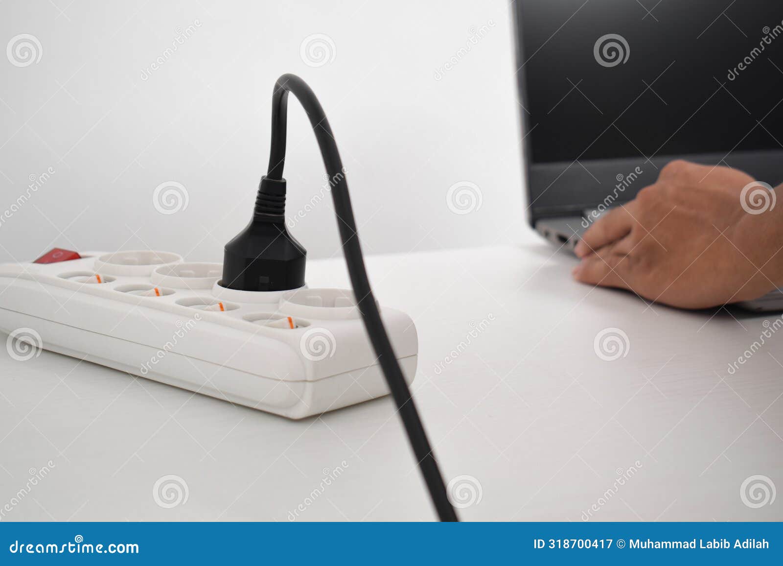 Electrical Plug in Outlet Socket at Home. Electric Plug, Power Cable ...